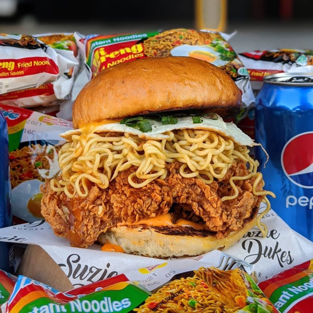 This Burger Joint Uses Indomie Instant Noodles As Toppings & It ...