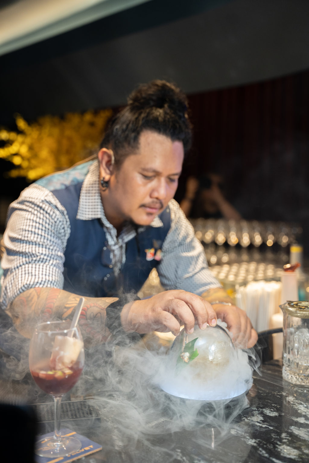 The bartender, Erik working his magic on movie-themed cocktails and ...